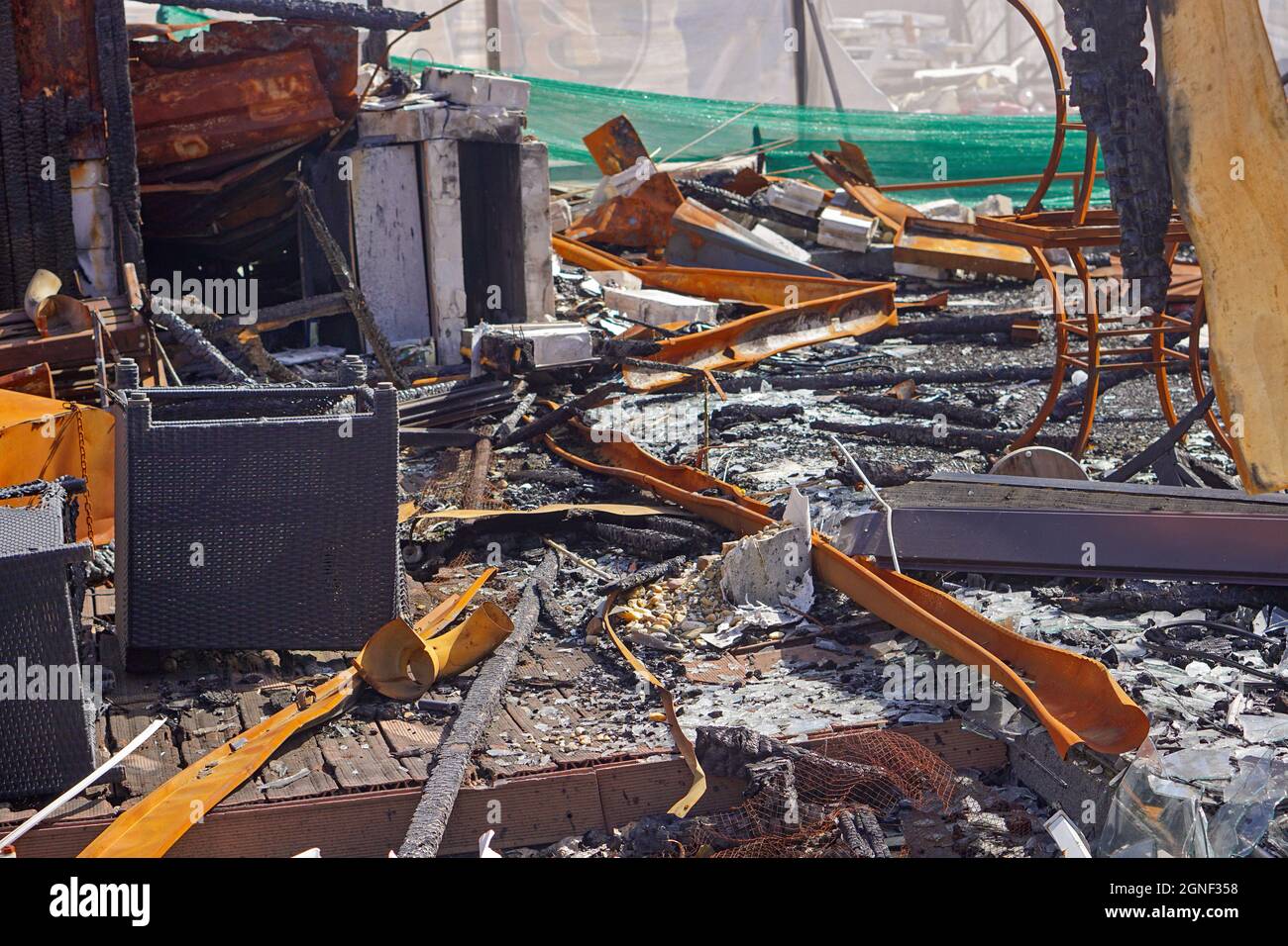 Burned down restaurant building damage problem Stock Photo - Alamy
