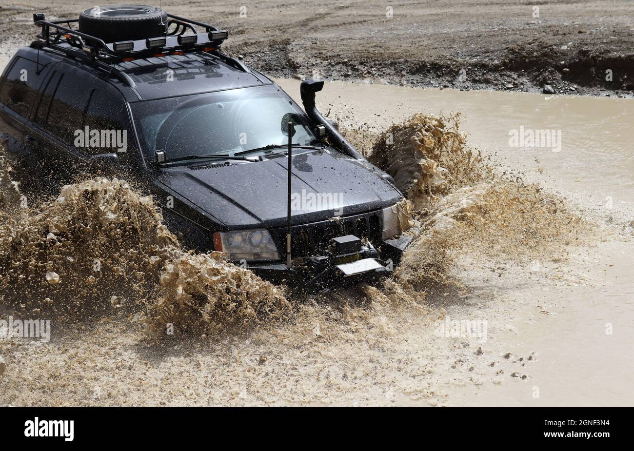 Jeep in the mud, off road racing Stock Photo - Alamy