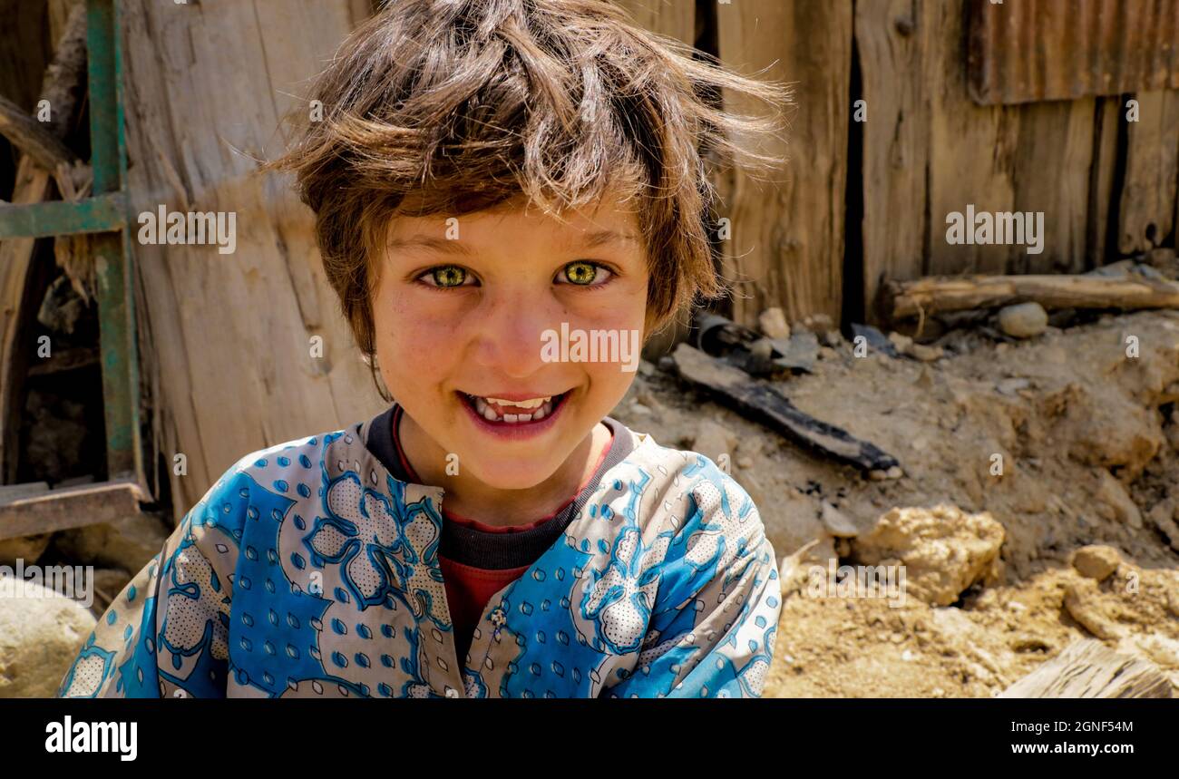 Bandipora, Jammu and Kashmir, India. 25th Sep, 2021. A dard girl smiles ...