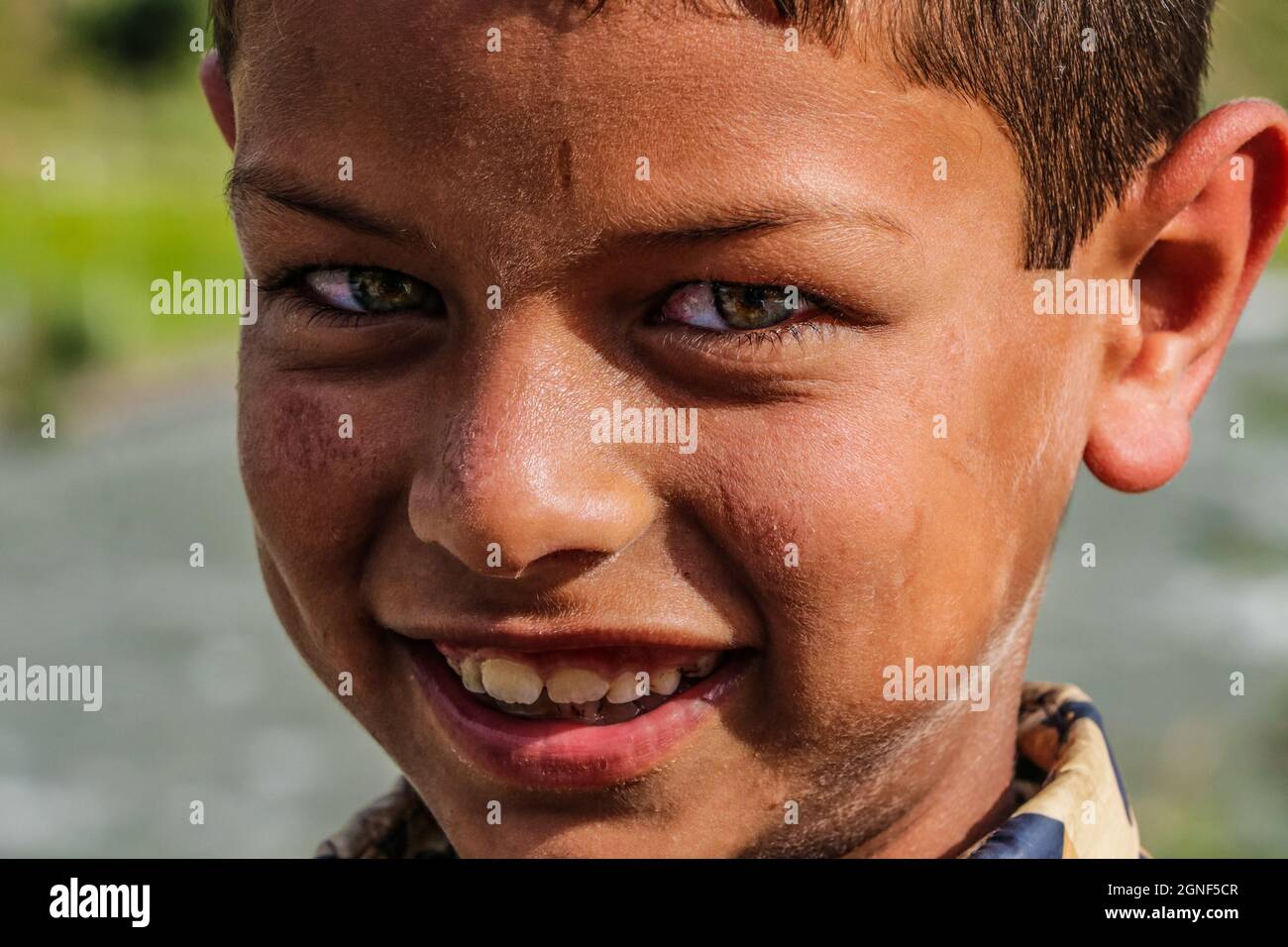 Bandipora, Jammu and Kashmir, India. 25th Sep, 2021. A dard boy poses ...