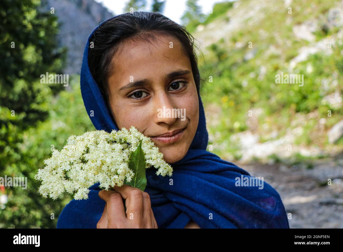 Bandipora, Jammu and Kashmir, India. 25th Sep, 2021. A dard girl poses ...