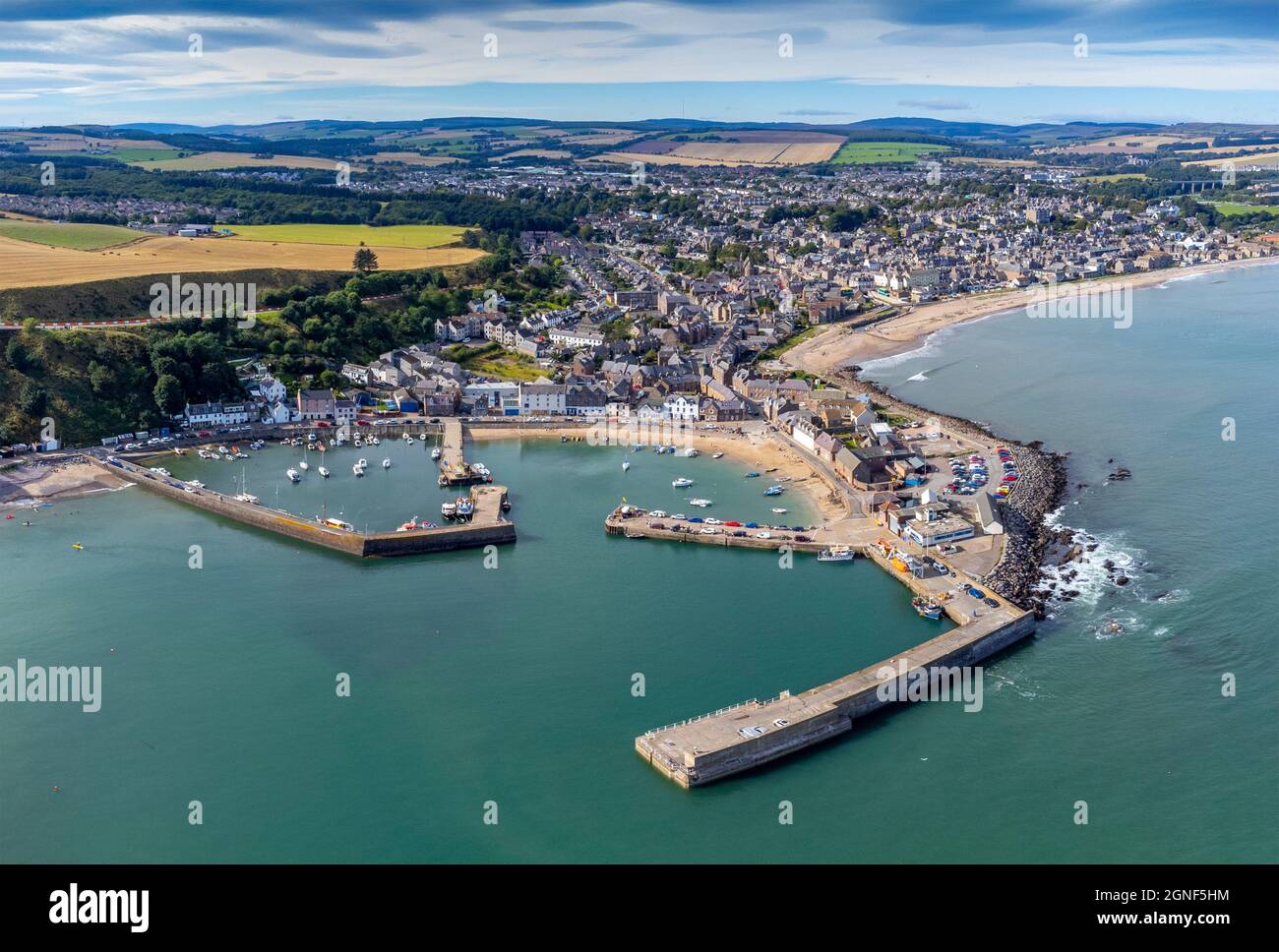 Aerial view from drone of seafront beach and harbour at Stonehaven in ...
