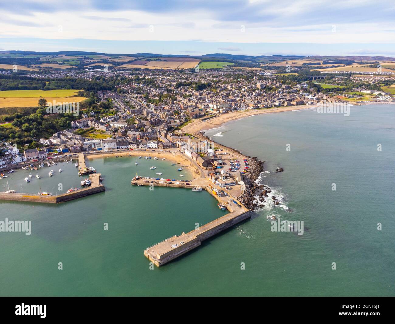 Aerial view from drone of seafront beach and harbour at Stonehaven in ...