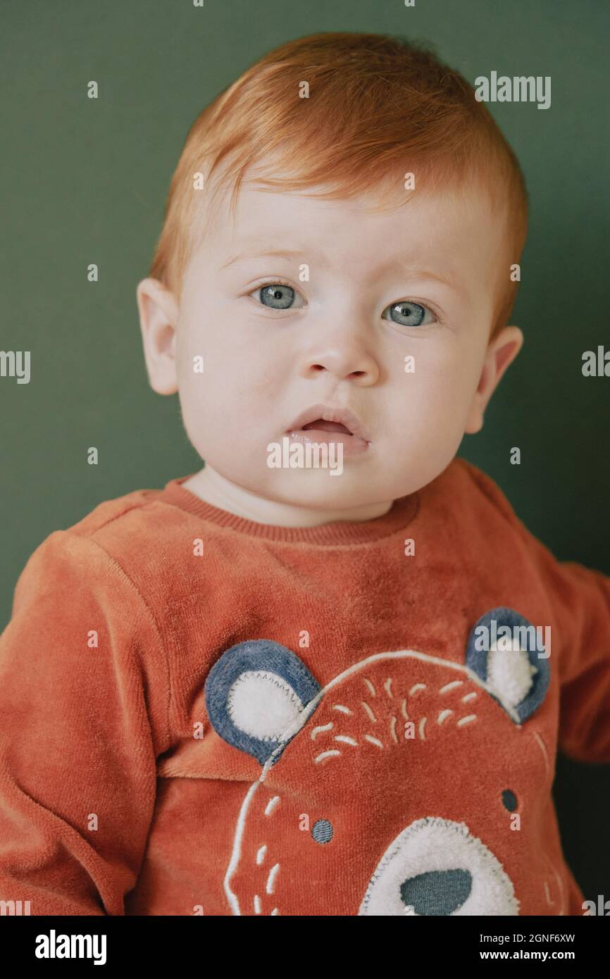 A seven-month old red haired baby girl Stock Photo - Alamy