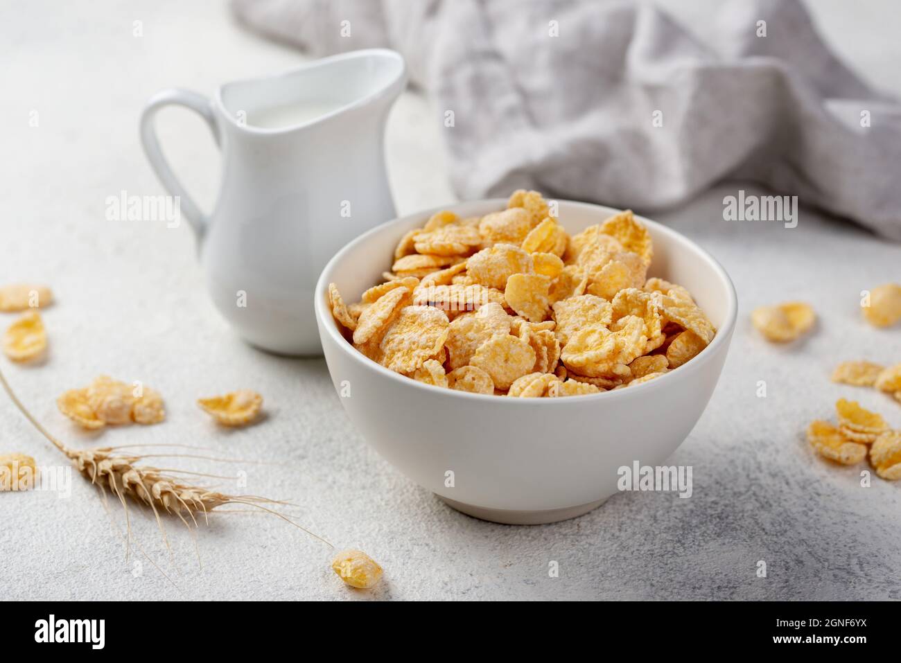 high angle breakfast corn flakes bowl with milk wheat. High quality and ...