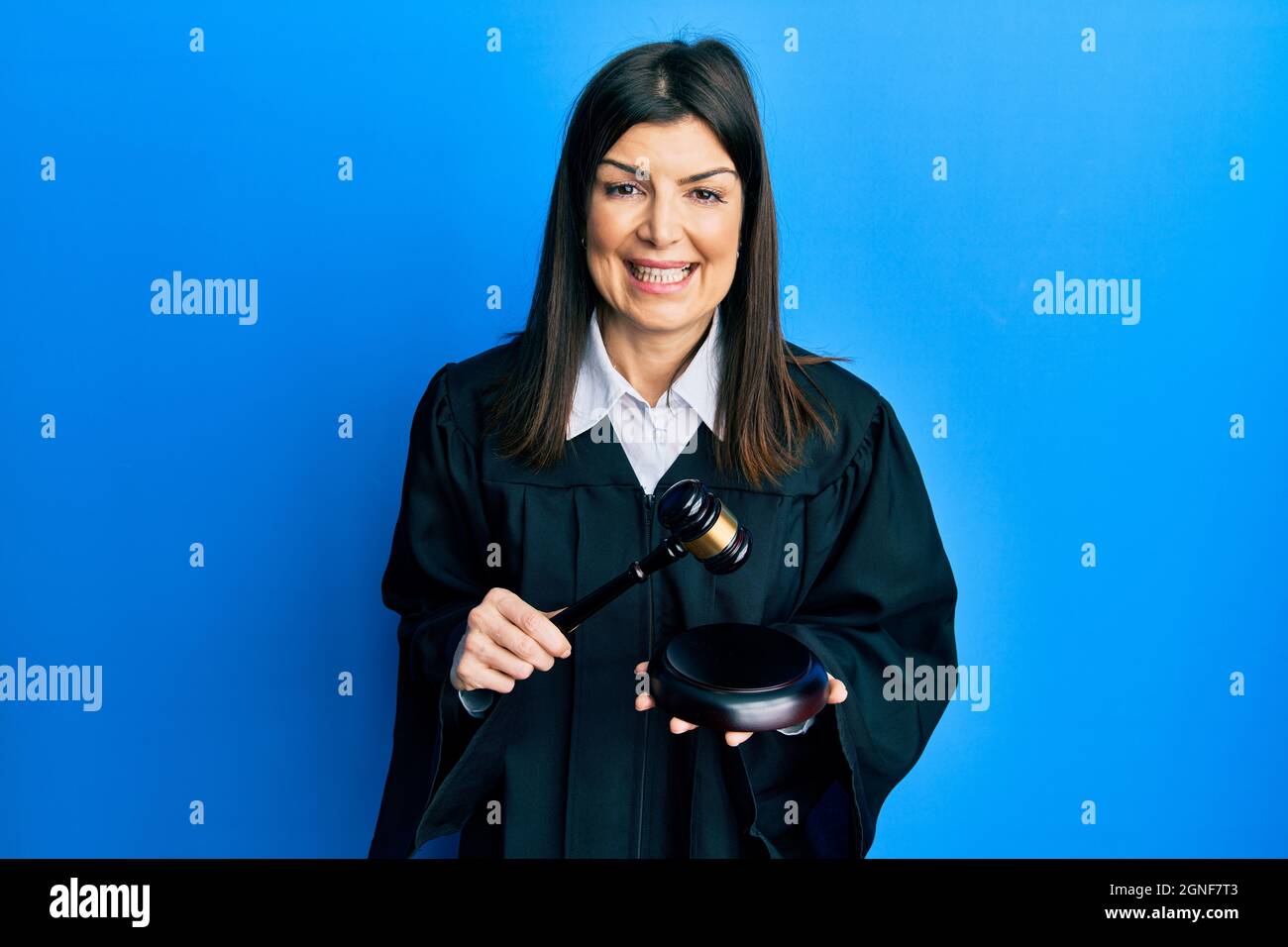 Girl using gavel hi-res stock photography and images - Alamy