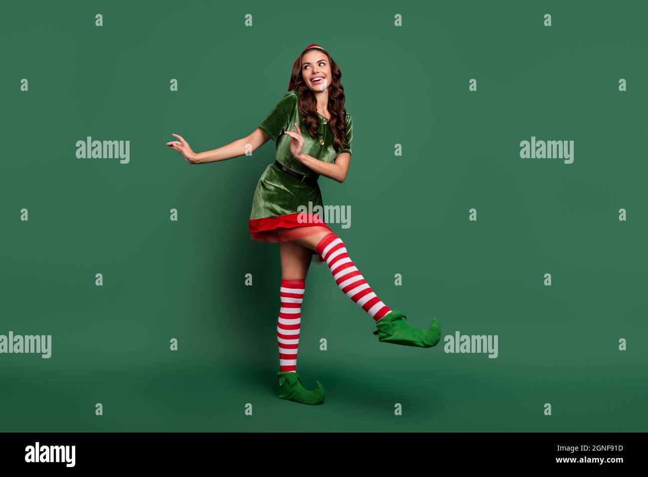 Full length body size view of attractive cheerful girl elf dancing ...