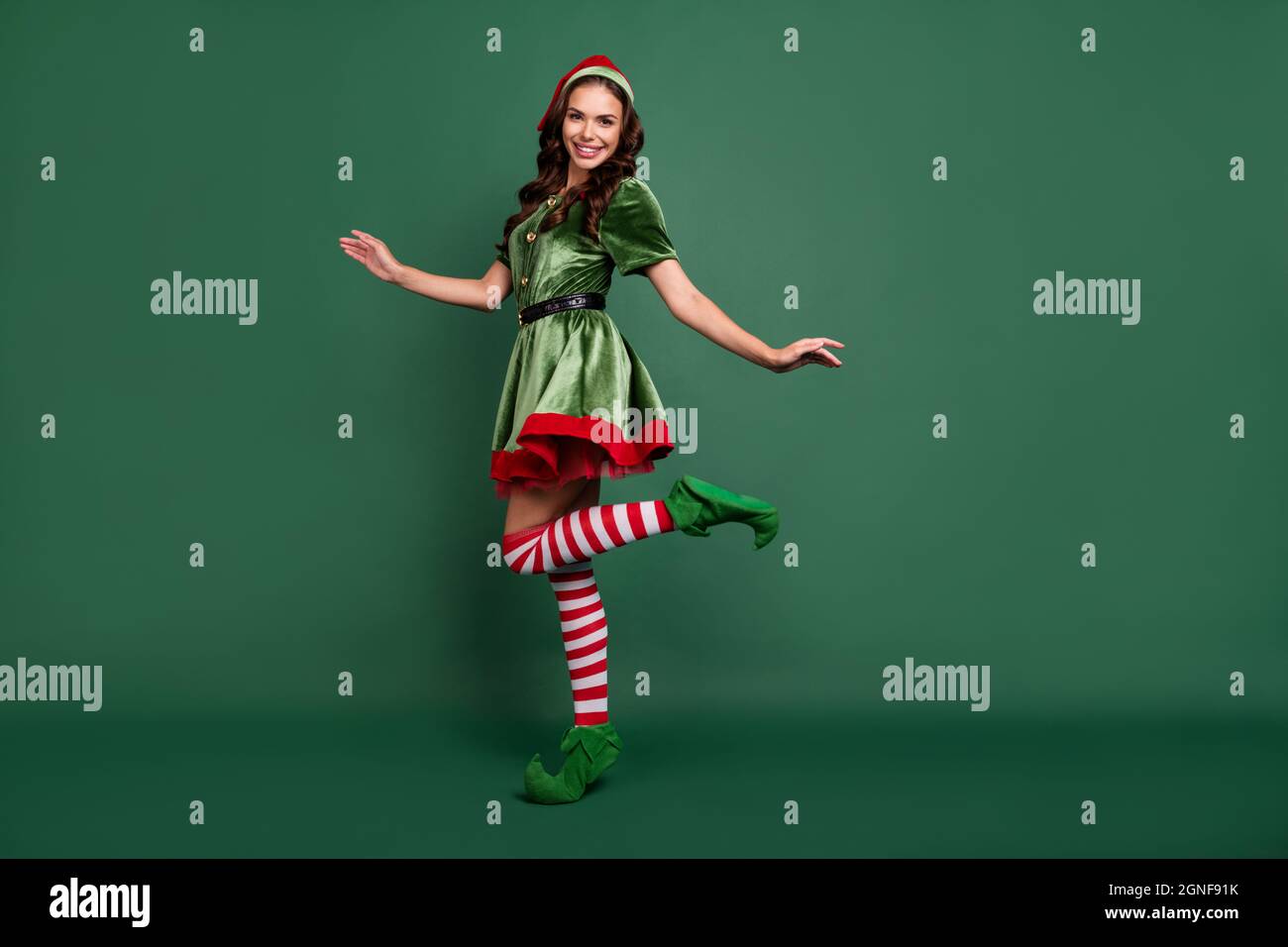 Full length body size view of attractive cheerful girl elf dancing ...
