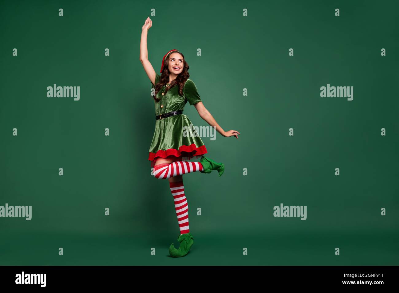Full length body size view of attractive cheerful girl elf dancing ...