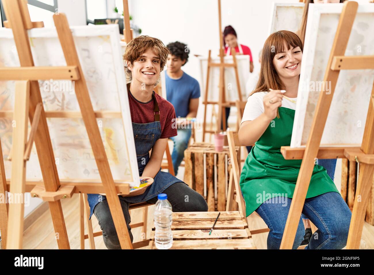 Group of young draw students smiling happy drawing at art studio Stock ...
