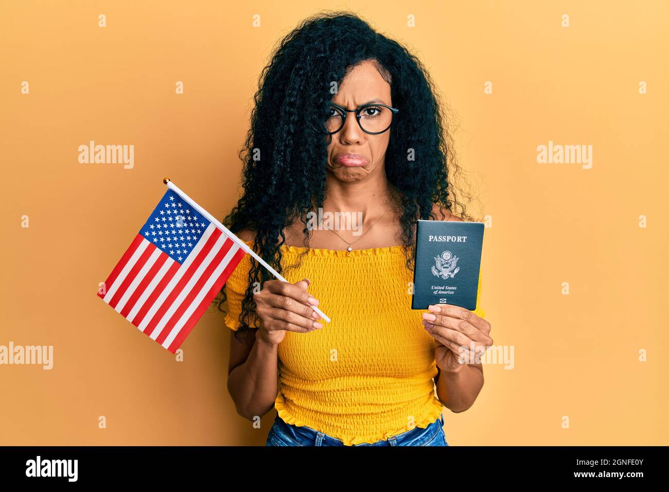 Woman crying holding american flag hi-res stock photography and images ...