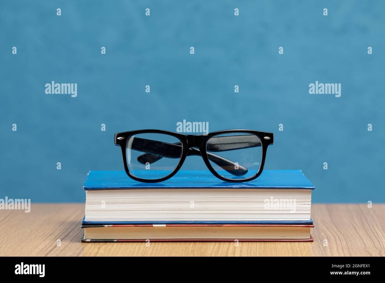 front view books with glasses. High quality and resolution beautiful ...