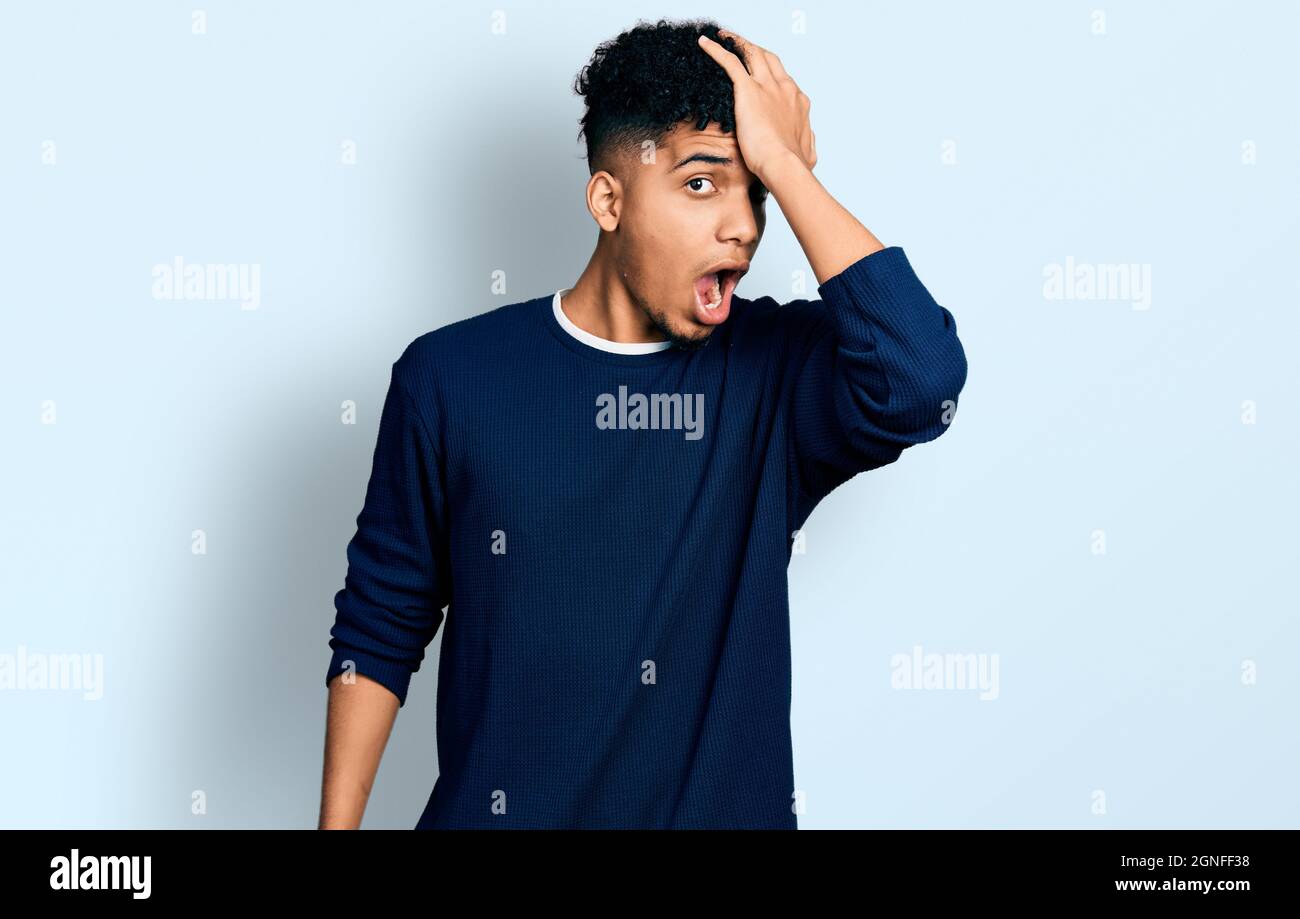 Young African American Man Wearing Casual Clothes Surprised With Hand On Head For Mistake 