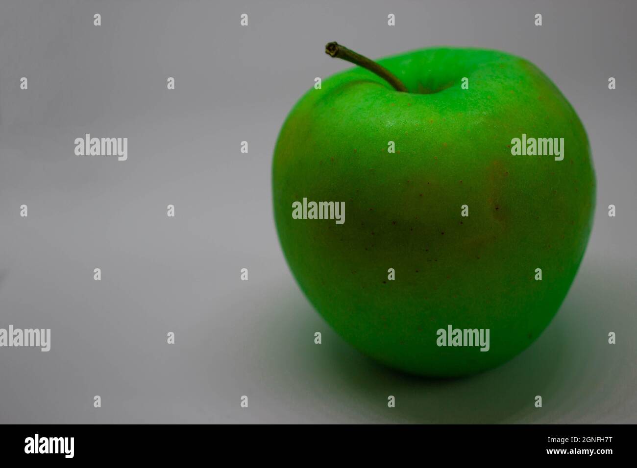 Green apple on white background with copy space. Text space Stock Photo ...