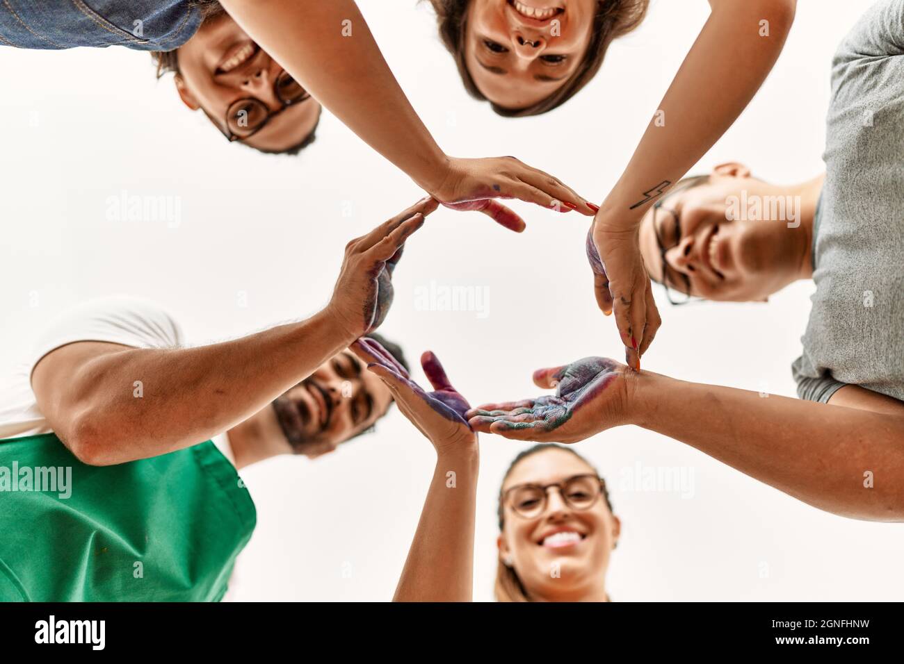 Group of people smiling happy with hands together art studio Stock ...