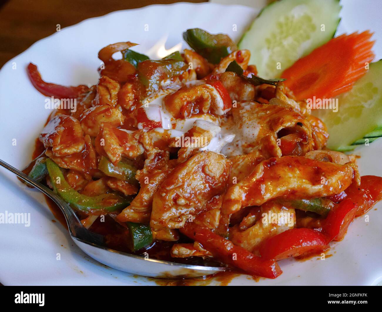 delicious chicken meat Panang Curry topping with coconut milk famous ...