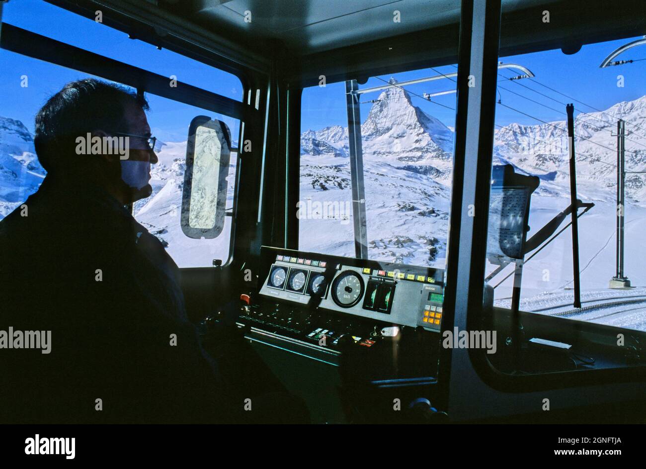 SWITZERLAND, VALAIS REGION, ZERMATT SKI RESORT, DRIVER OF THE ...