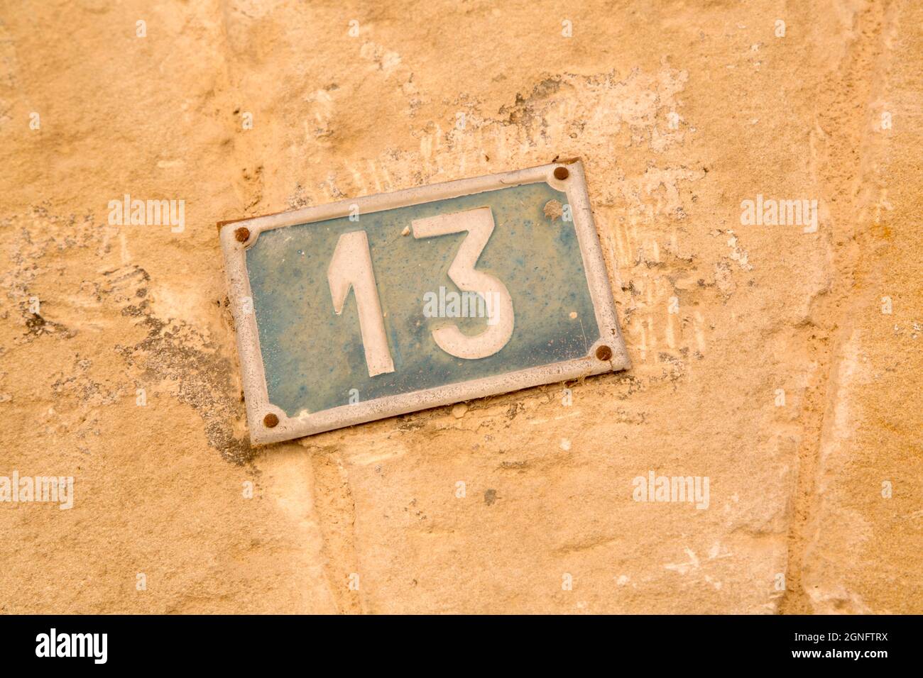 Number Thirteen Sign on Wall Stock Photo - Alamy