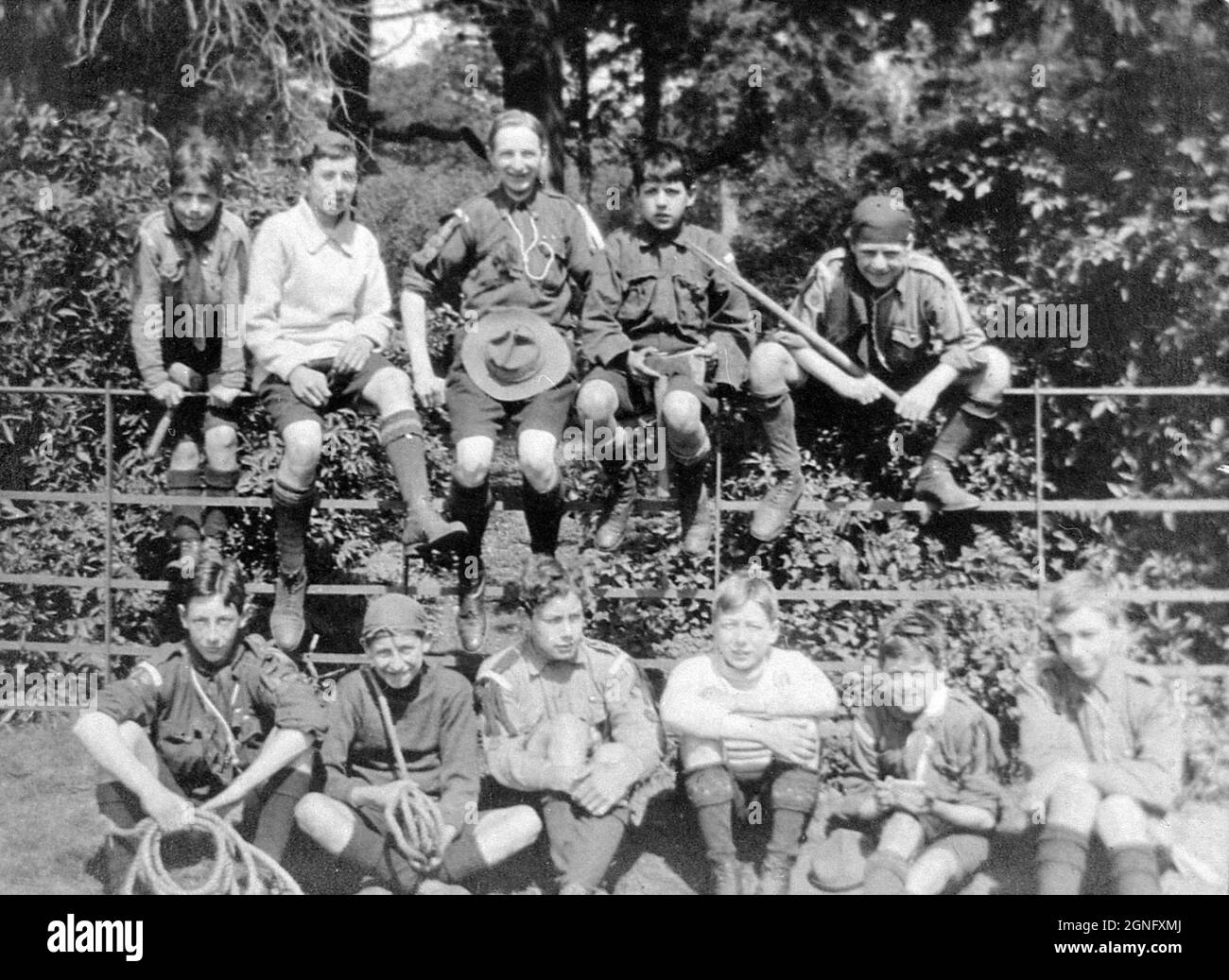 Members of the 28th Company, Beckenham Boy Scouts taking a break during ...