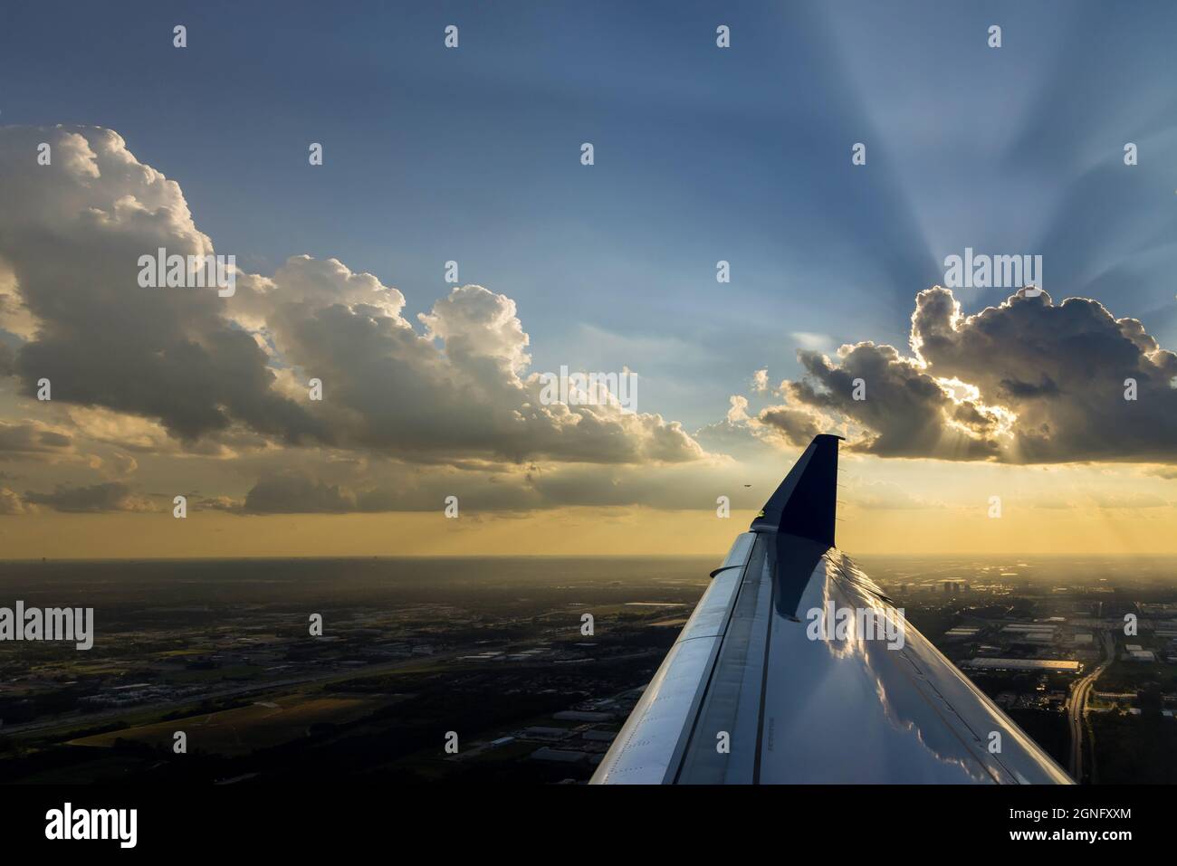 Aircraft landing on sunset aerial hi-res stock photography and images ...