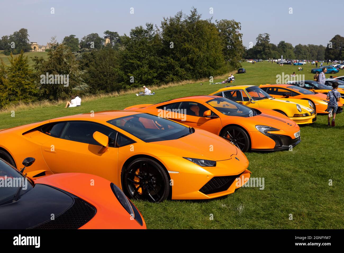 Collection of orange supercars at the Salon Privé motor show held at ...