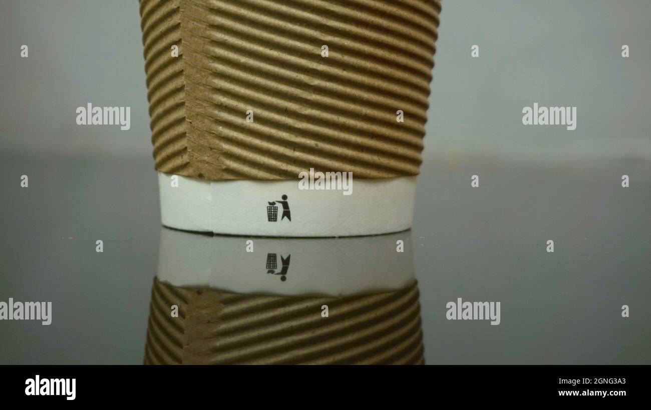 Disposable paper ribbed drinks cup, tiny Keep Britain Tidy logo and ...