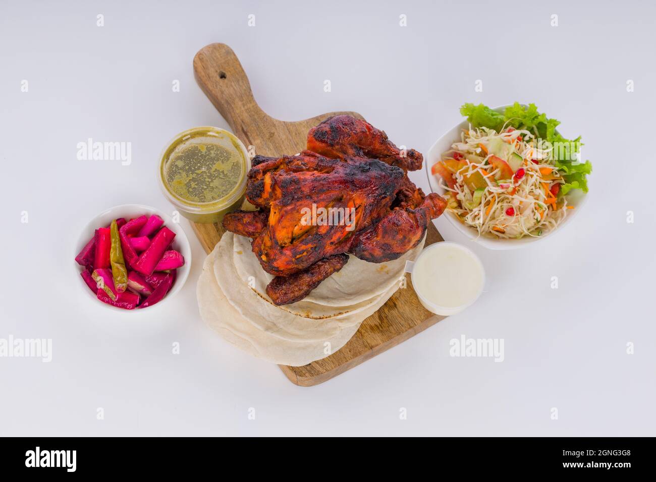Shawai chicken with kuboose and dips Stock Photo - Alamy