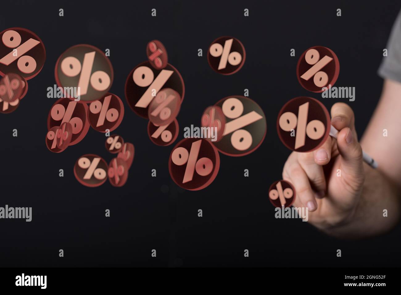 Group of red, 3D icons of percentage with a hand of a man in the ...