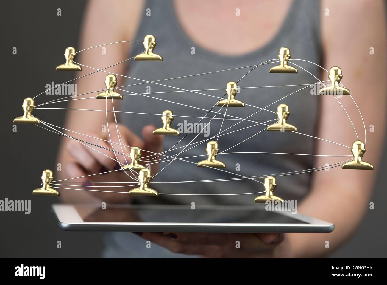 Unity group and teamwork concept above a tablet of a woman in the ...
