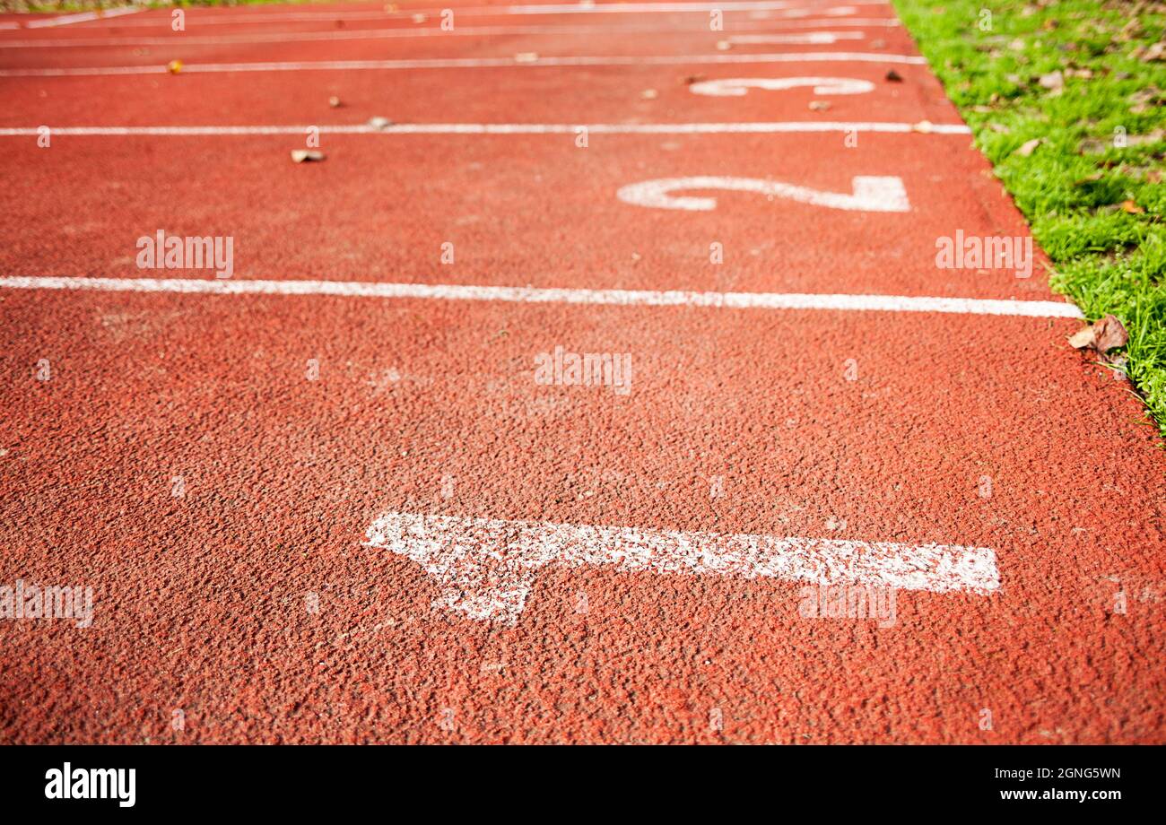 white numbers printed on the running lanes Stock Photo - Alamy