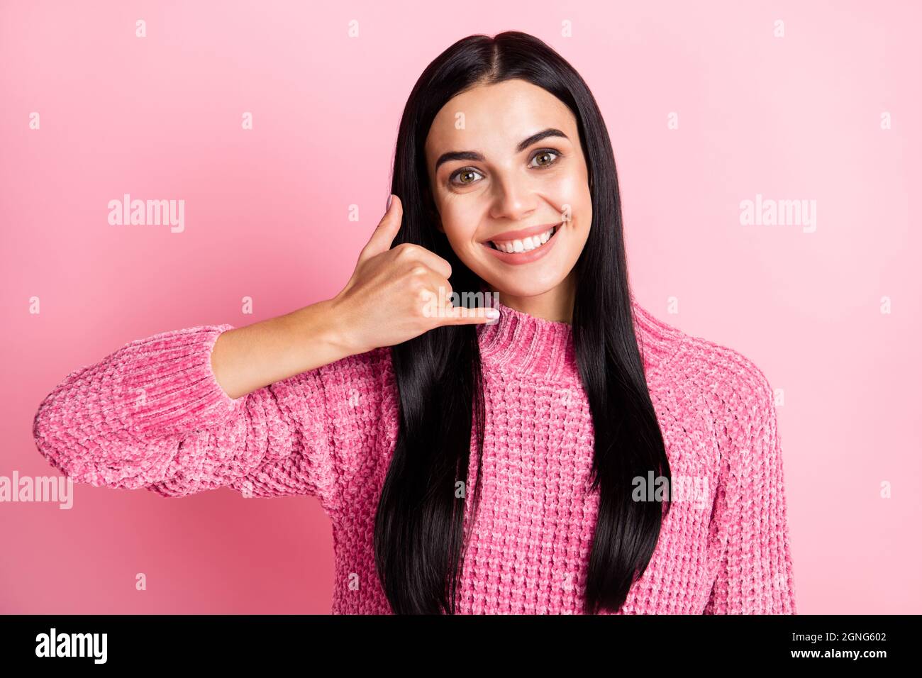Photo of adorable cheerful young girl arm finger show phone call me ...