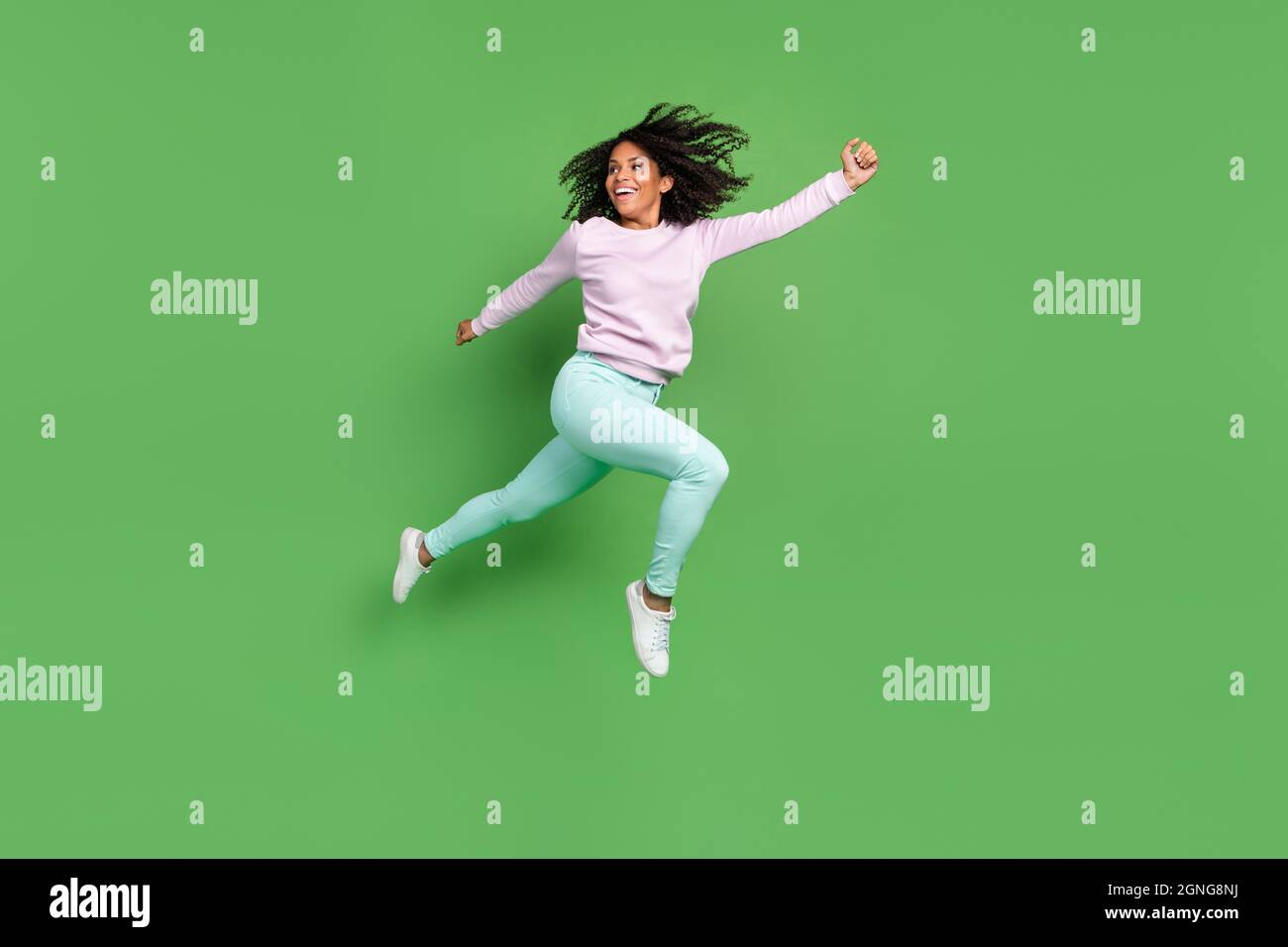 Full body photo of funky young brunette lady jump wear pullover pants ...