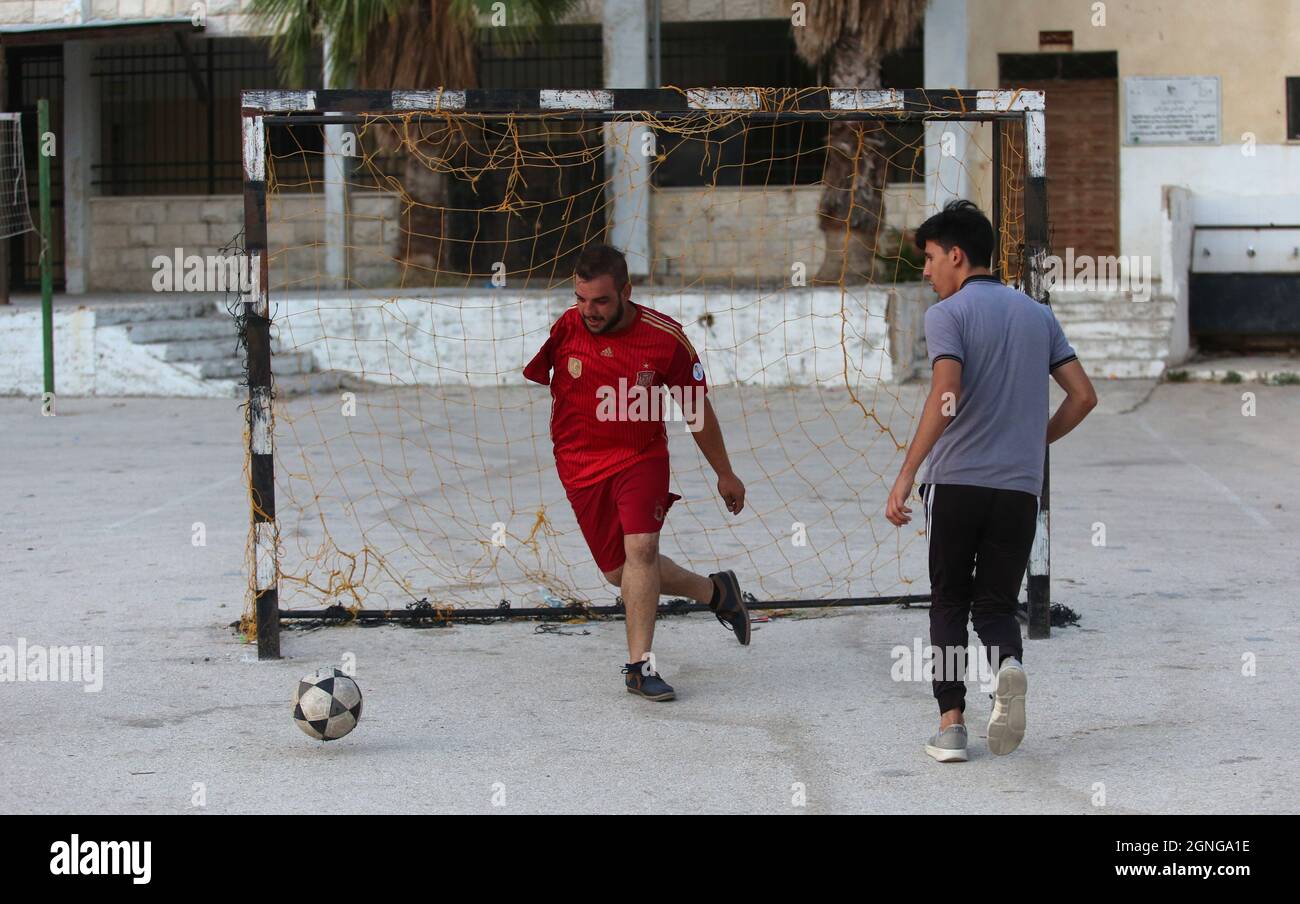 Nablus. 15th Sep, 2021. Oday Nasser (L) trains at a small stadium in ...
