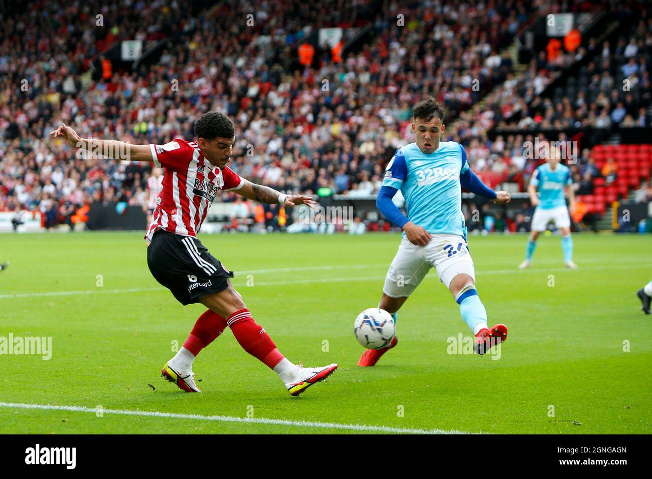 Morgan Gibbs-White #27 of Sheffield United and Lee Buchanan #26 of ...