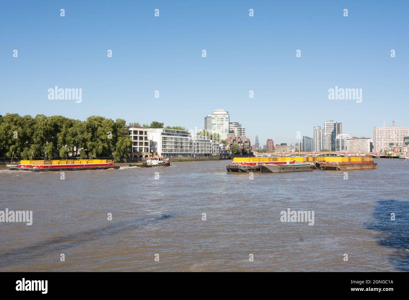 Redoubt a Thames tugboat pulling Cory container barges down the River ...