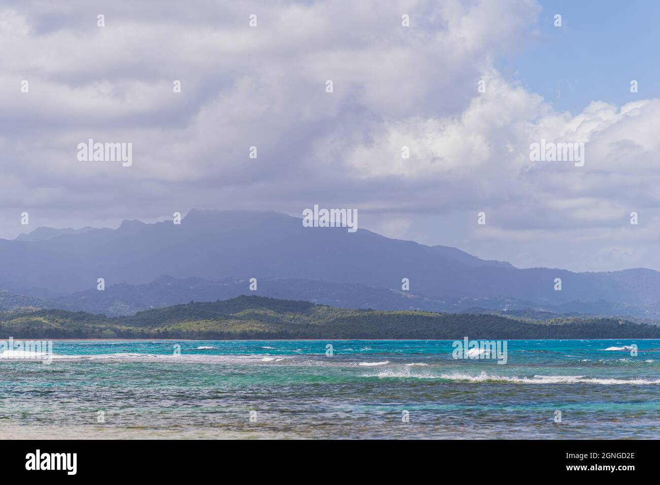 Dark rain clouds hang over the mountains of El Junque Rain Forest in ...