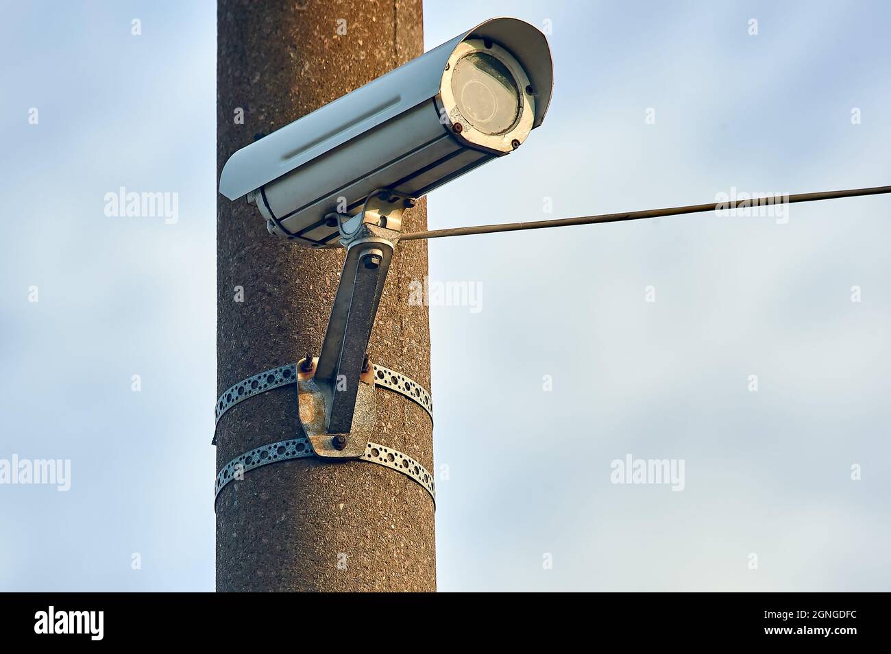 Surveillance camera hanging on the wall hi-res stock photography and ...