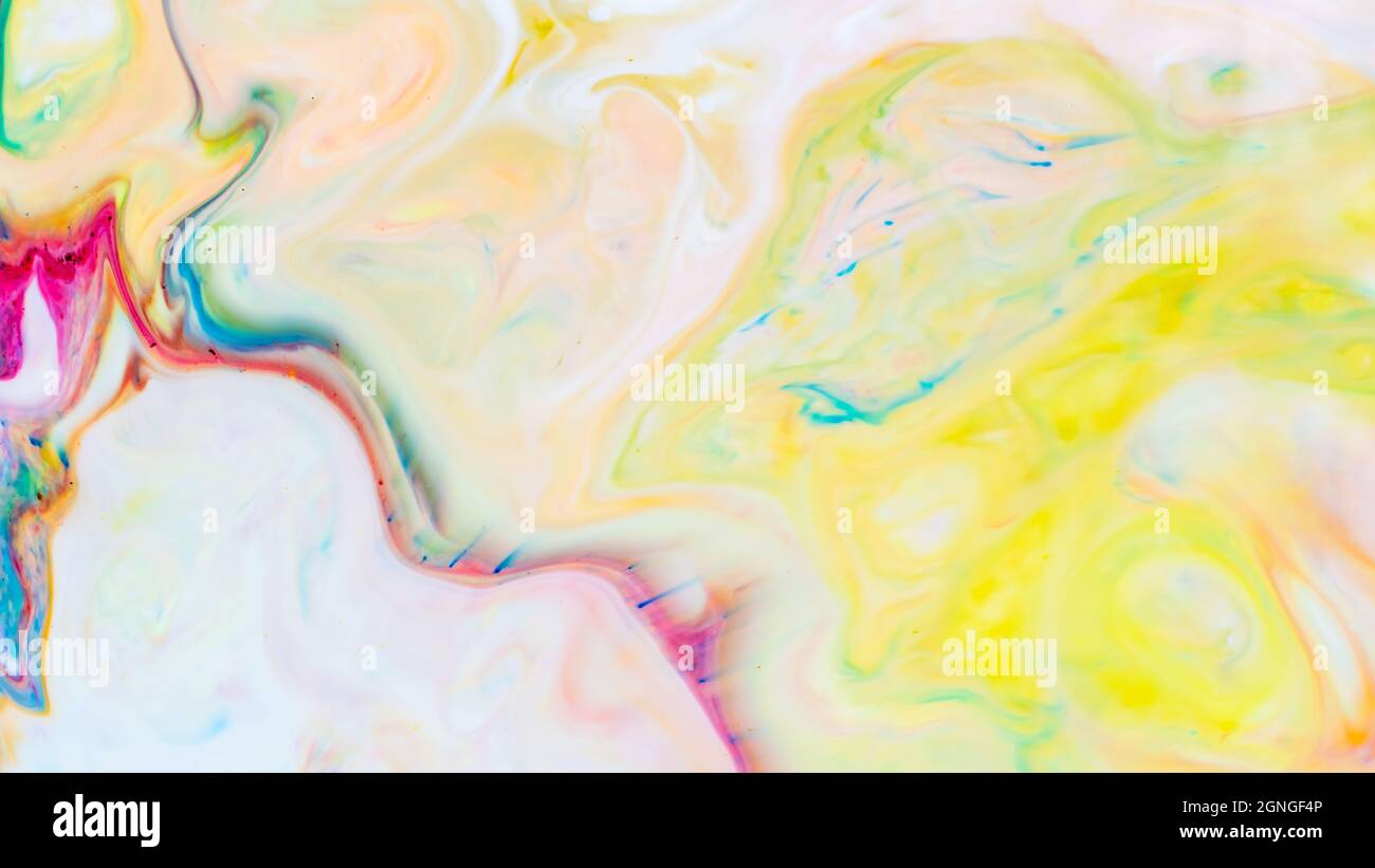 Multicolored lines and spots on liquid surface. Abstract background ...