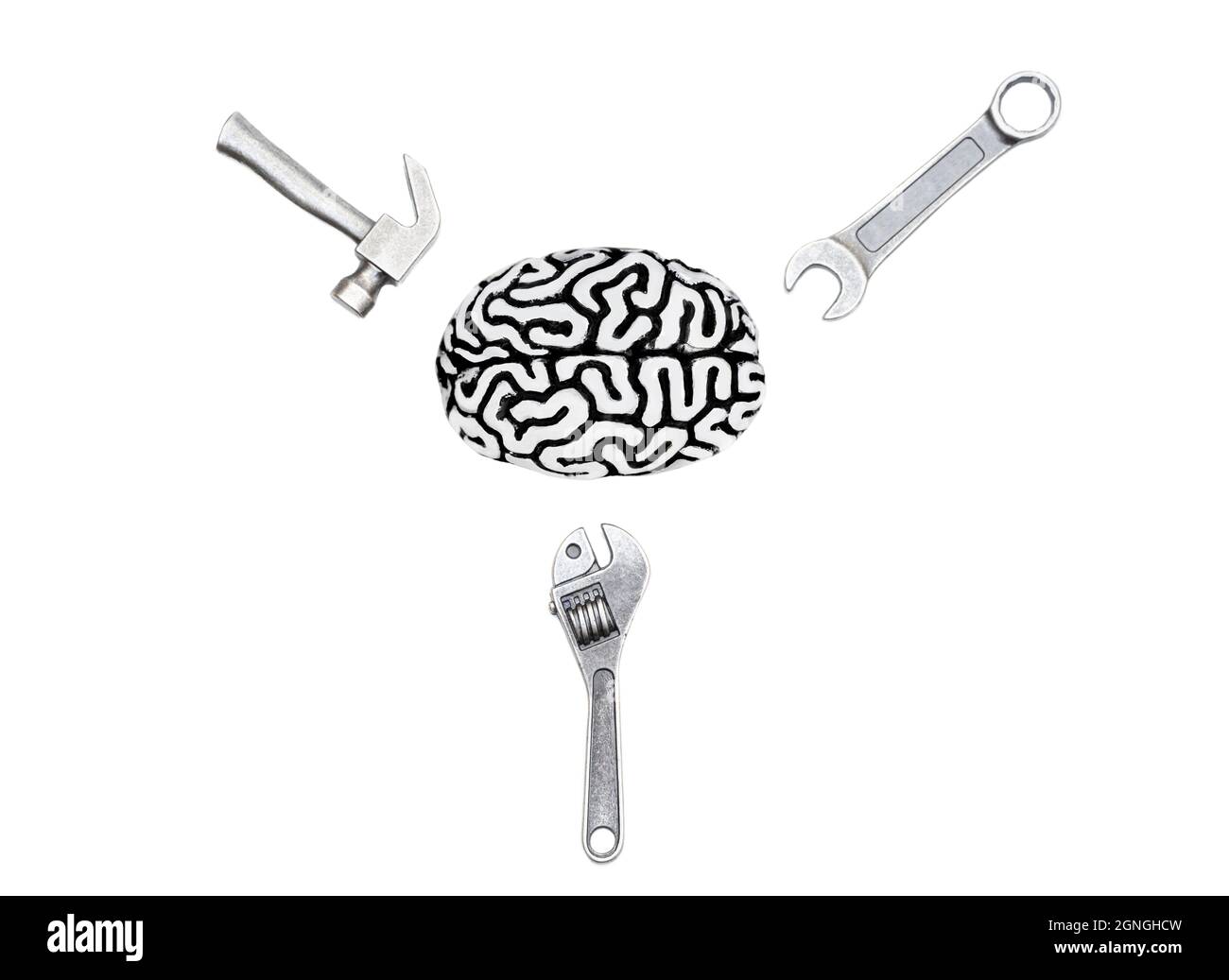 Human brain model made of steel with a kit of hand tools isolated on ...