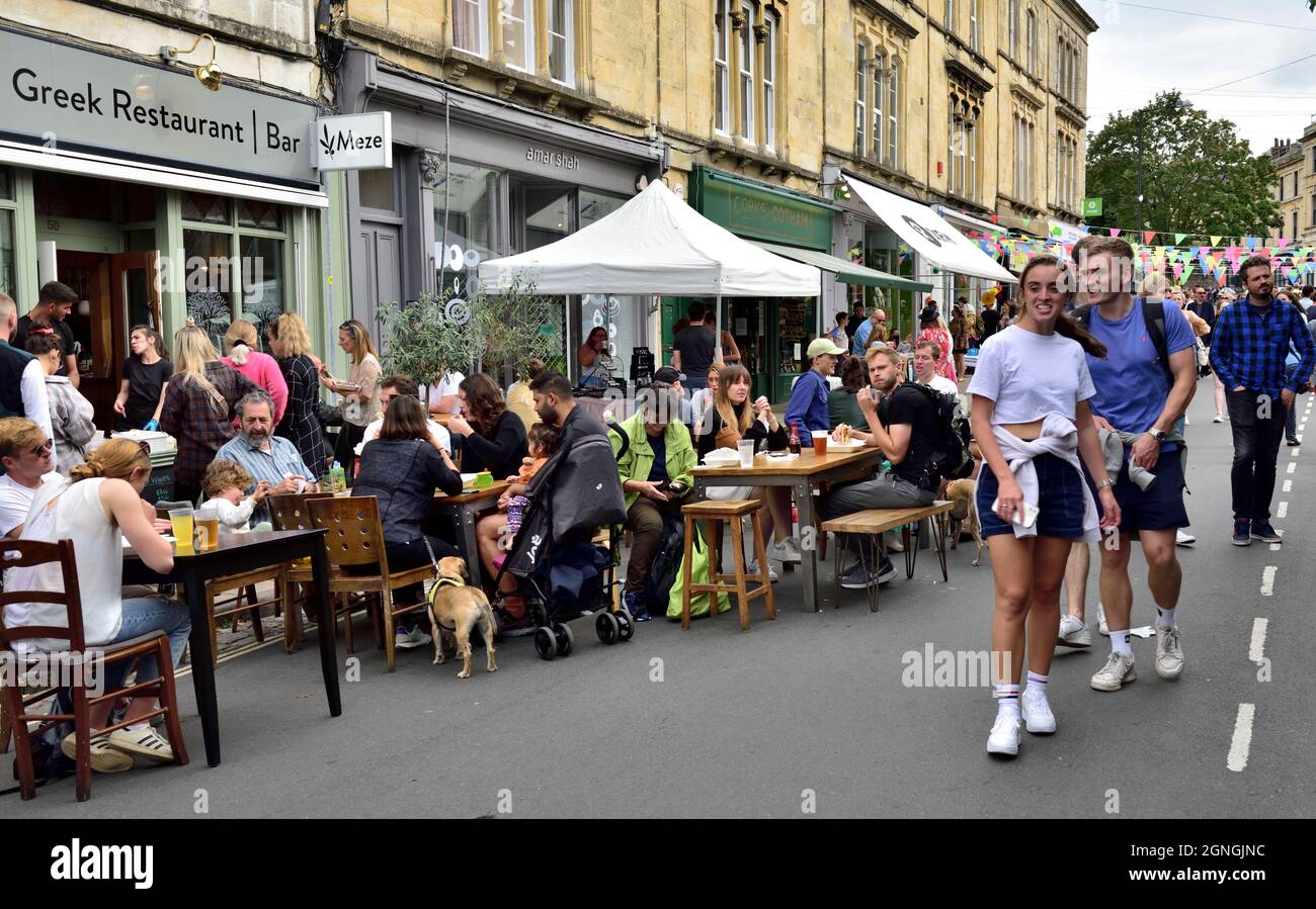 Street party, road pedestrianized with cafes, restaurants and bars ...