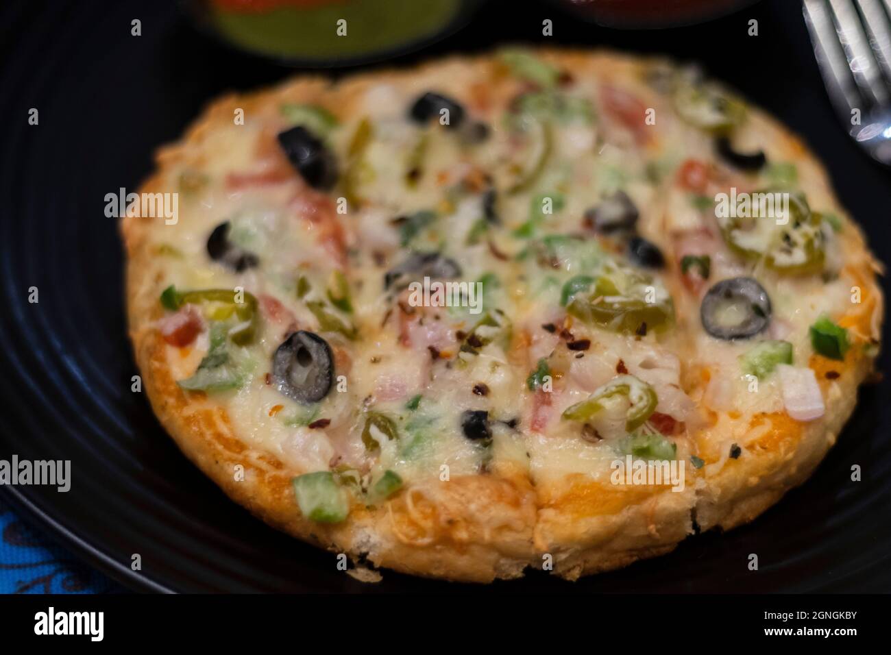 Small cheese pizza with different toppings hi-res stock photography and ...