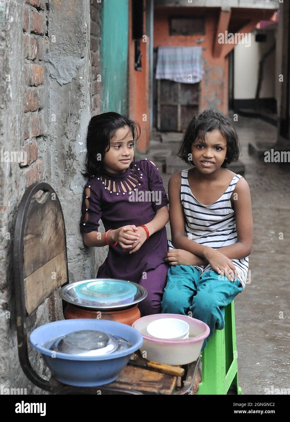 Life as a Bihari. Portrait of two Bihari Girls selling food. ‘Biharis ...