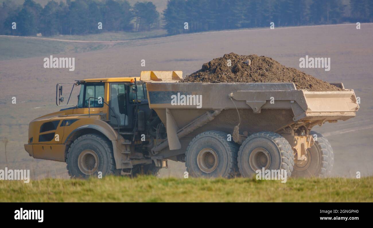 yellow Volvo A40E articulated dump truck earth mover with a full 25 ...