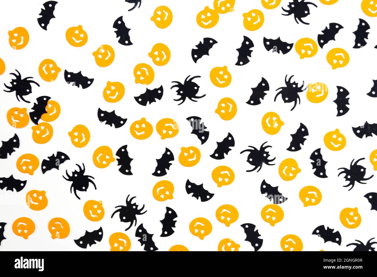 Halloween decorations with spiders on a white background. Top view ...