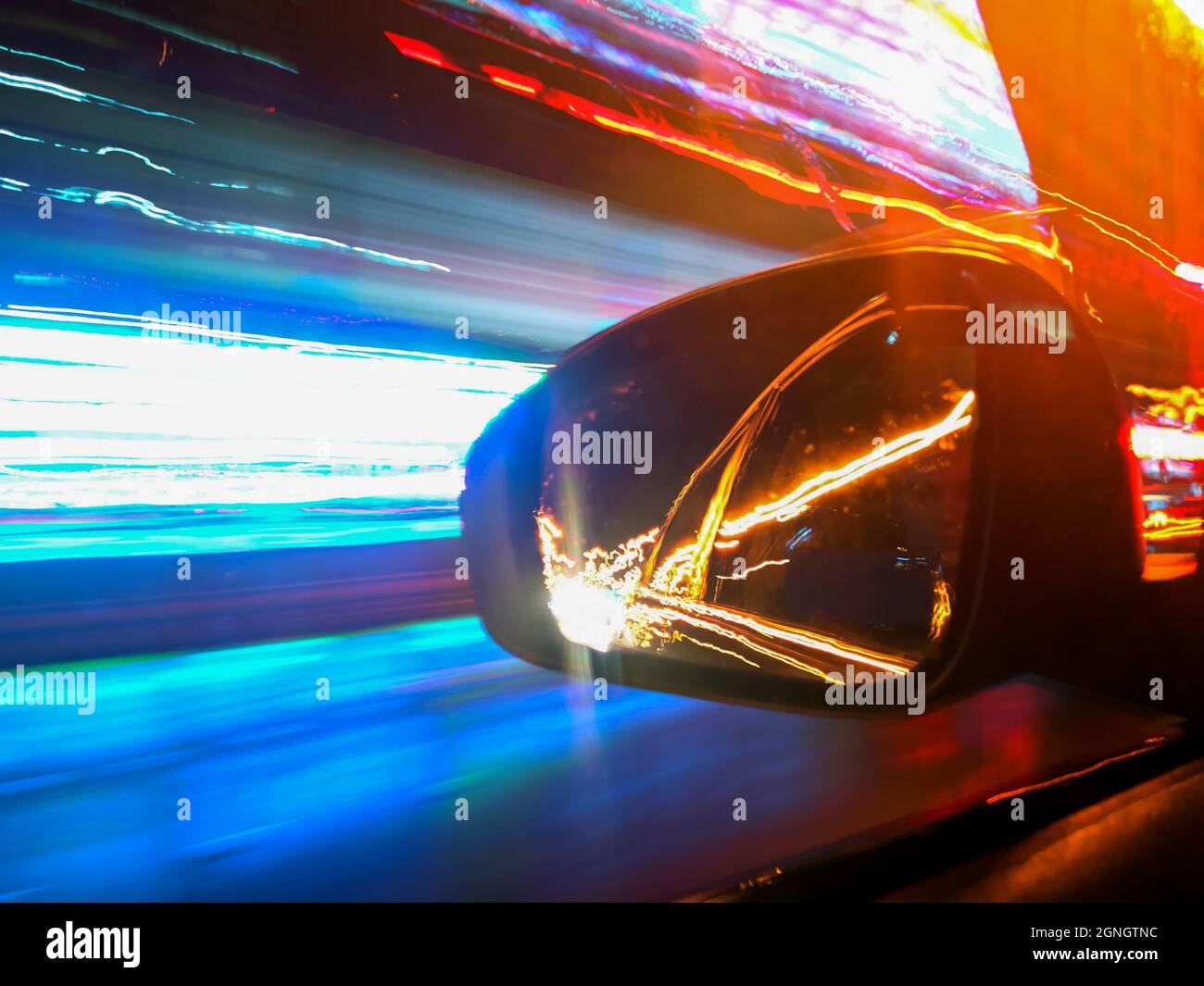 Blue, orange and red light neon lanes shooting on long exposure from ...