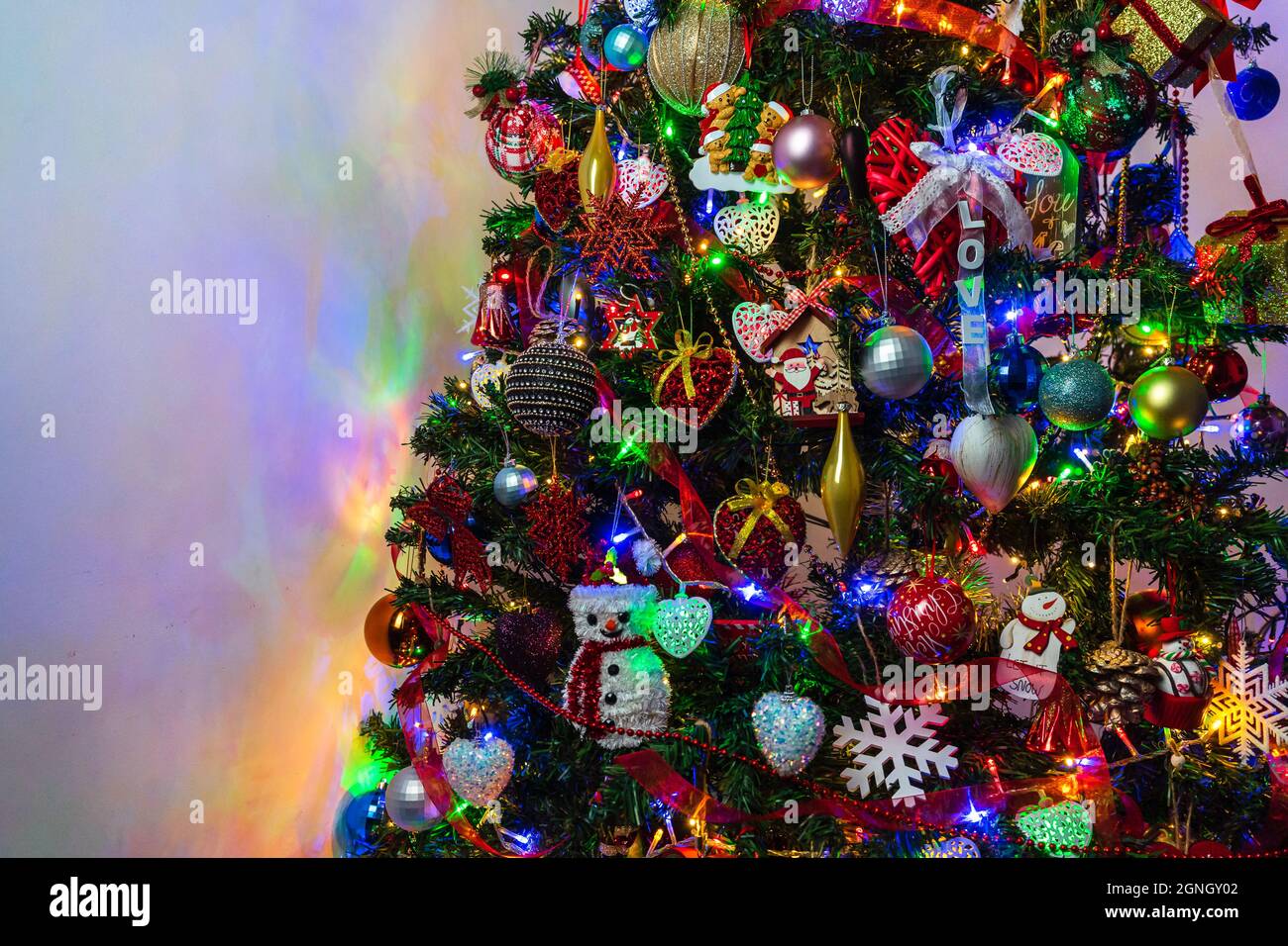 Beautiful Christmas tree with lights and decorations Stock Photo - Alamy