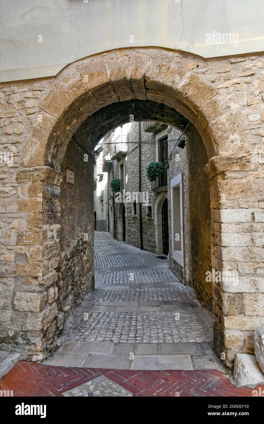A narrow street in Monteroduni, a medieval town of Molise region, Italy ...