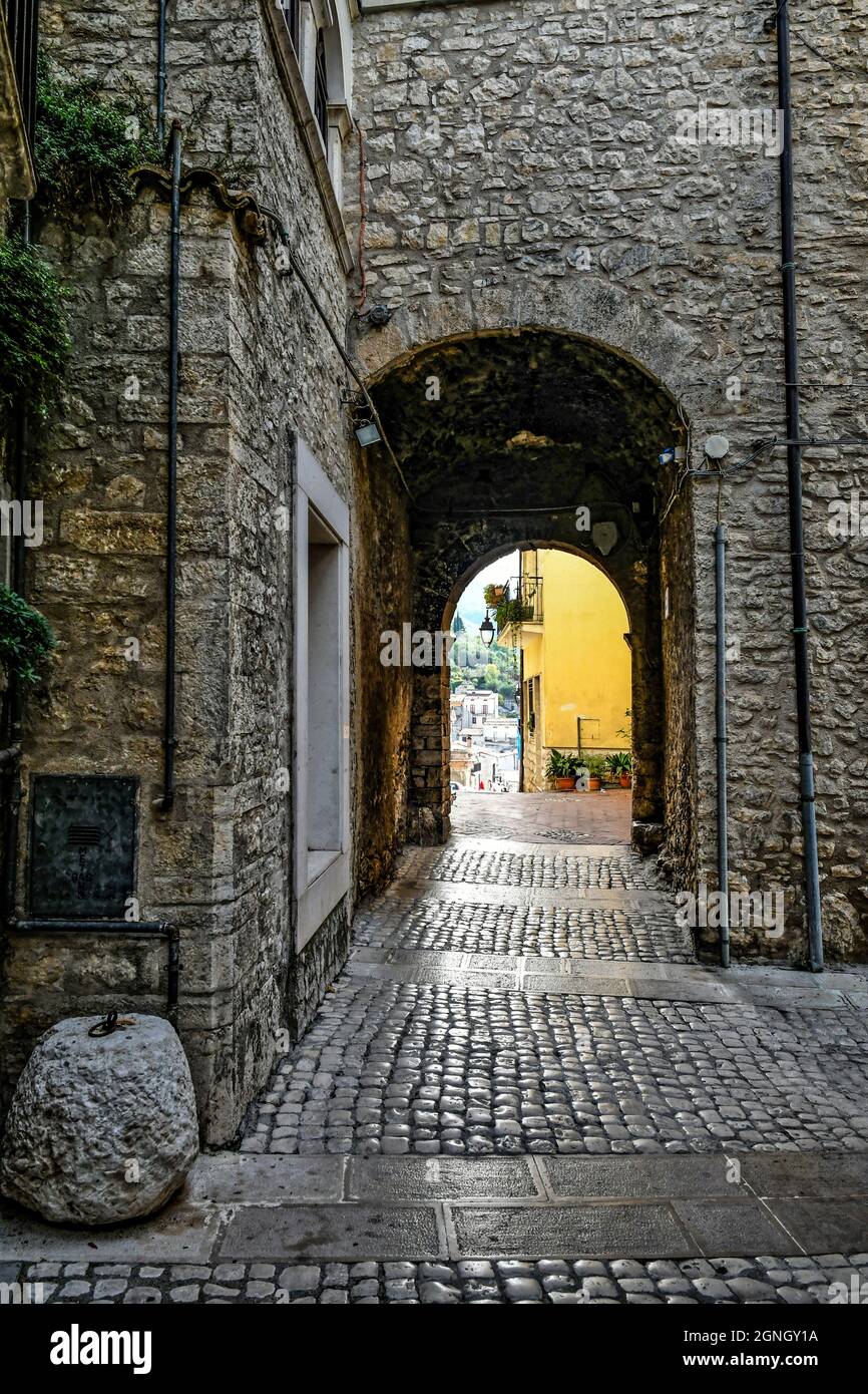 A narrow street in Monteroduni, a medieval town of Molise region, Italy ...