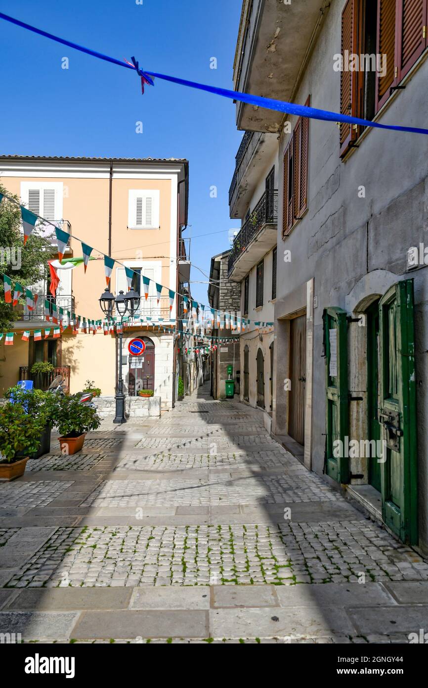 A narrow street in Monteroduni, a medieval town of Molise region, Italy ...