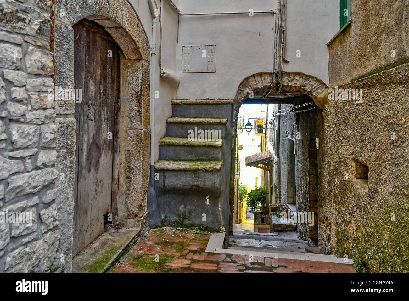 A narrow street in Monteroduni, a medieval town of Molise region, Italy ...
